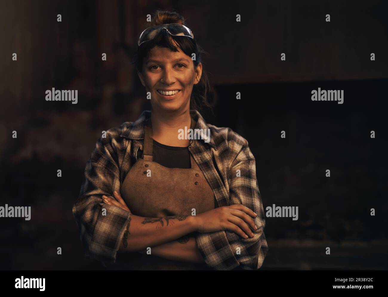 Woman blacksmith portrait smile hi-res stock photography and images - Alamy