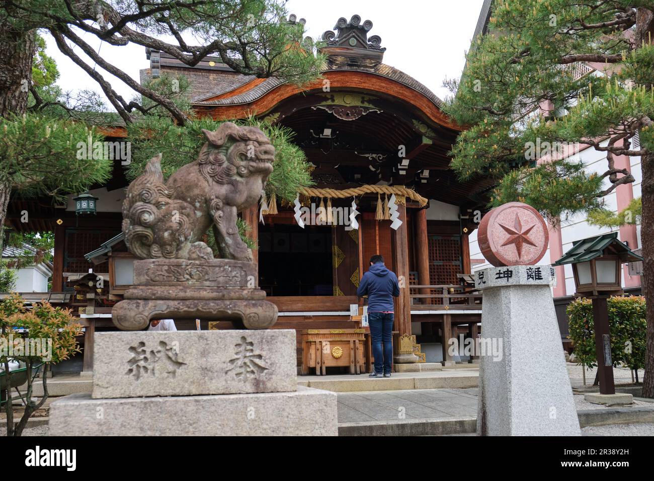 Kyoto, Japan. April 25, 2023: Japanese man praying at Daishogun Hachi ...