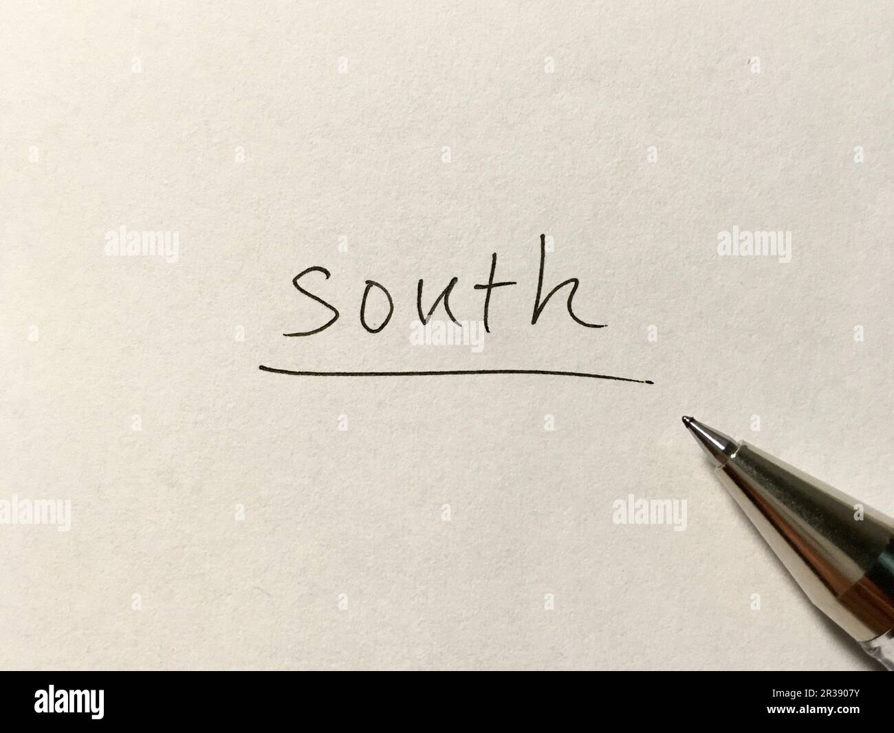 South concept word on paper background Stock Photo - Alamy