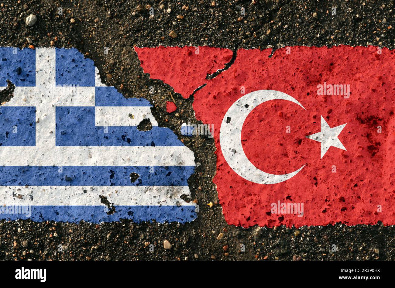 On the pavement are images of the flags of Greece and Turkey, as a ...