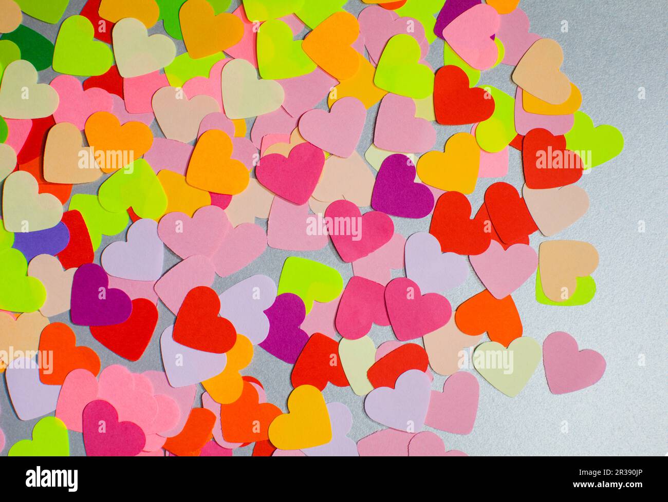Paper rainbow colors hearts as a pattern for design Stock Photo - Alamy