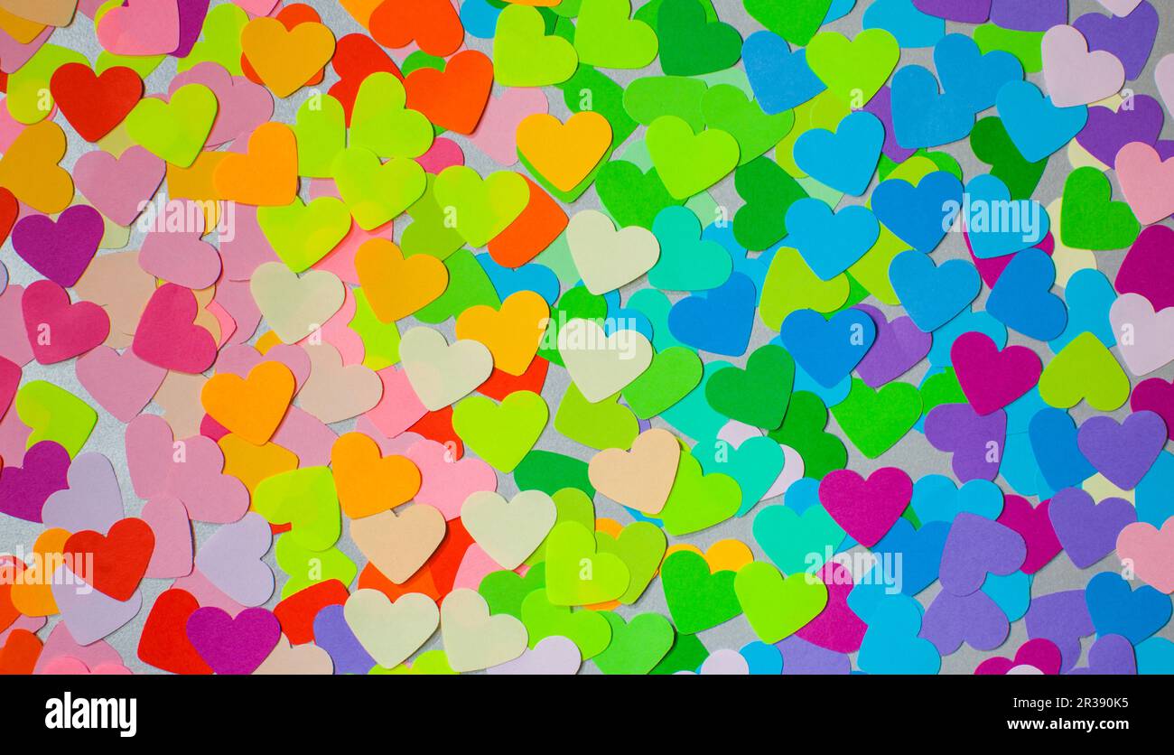 Paper rainbow colors hearts as a pattern for design Stock Photo - Alamy