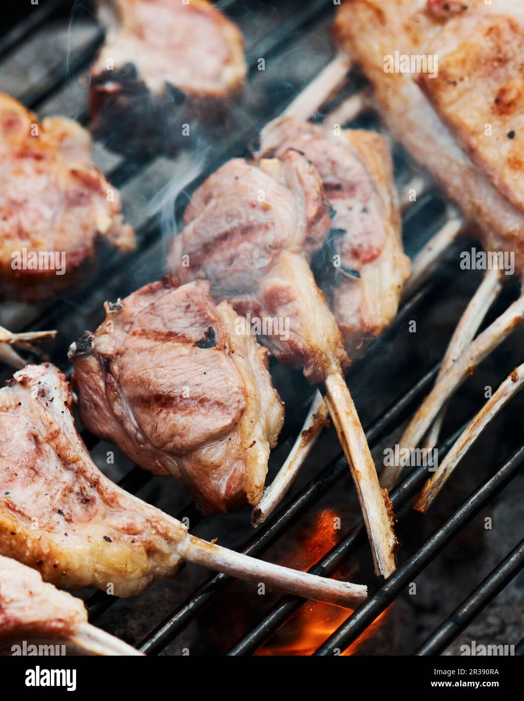 Racks of lamb on a barbecue Stock Photo - Alamy