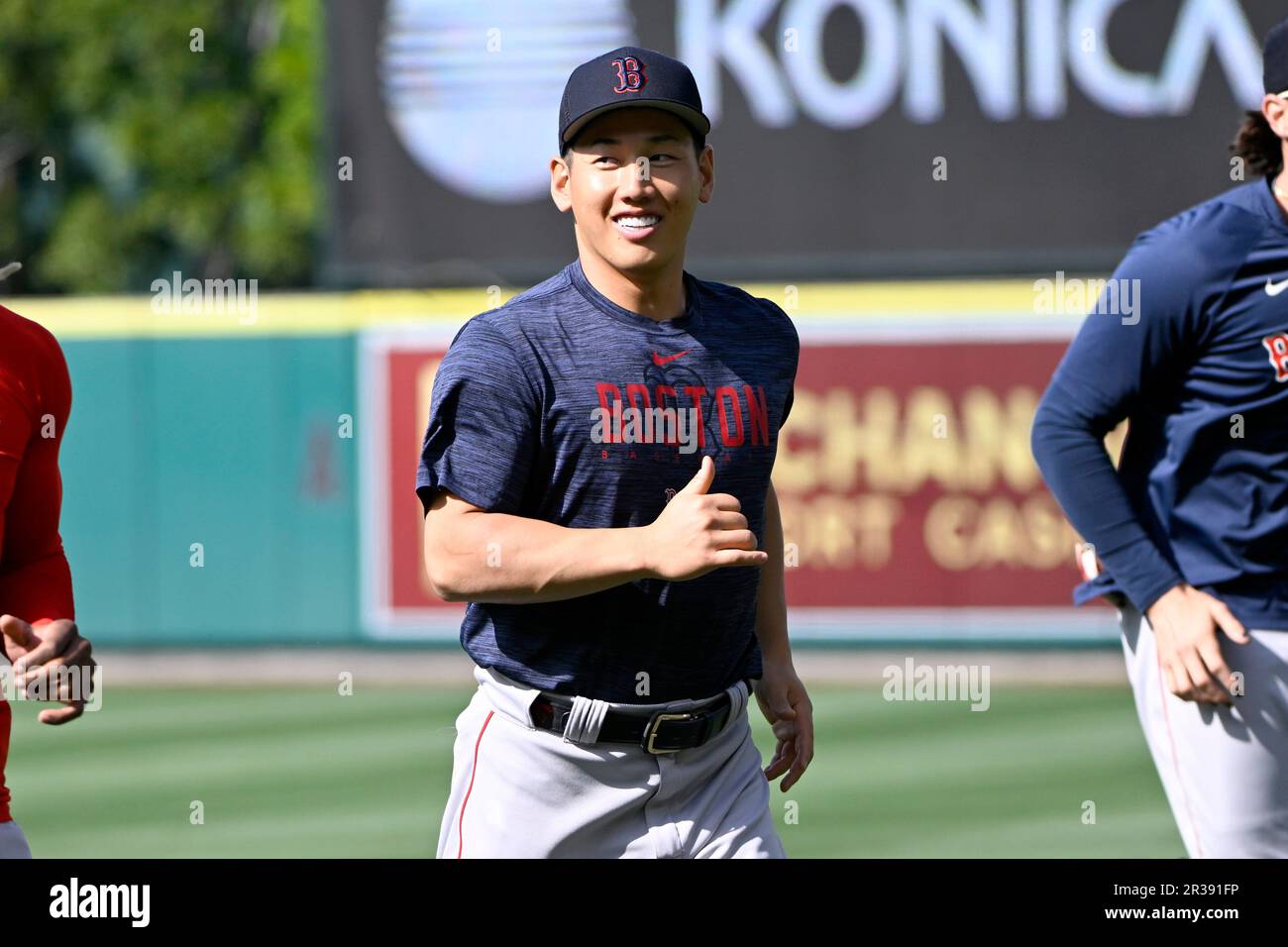 Boston Red Sox's Masataka Yoshida smiles during warmups before a baseball game against the Los ...