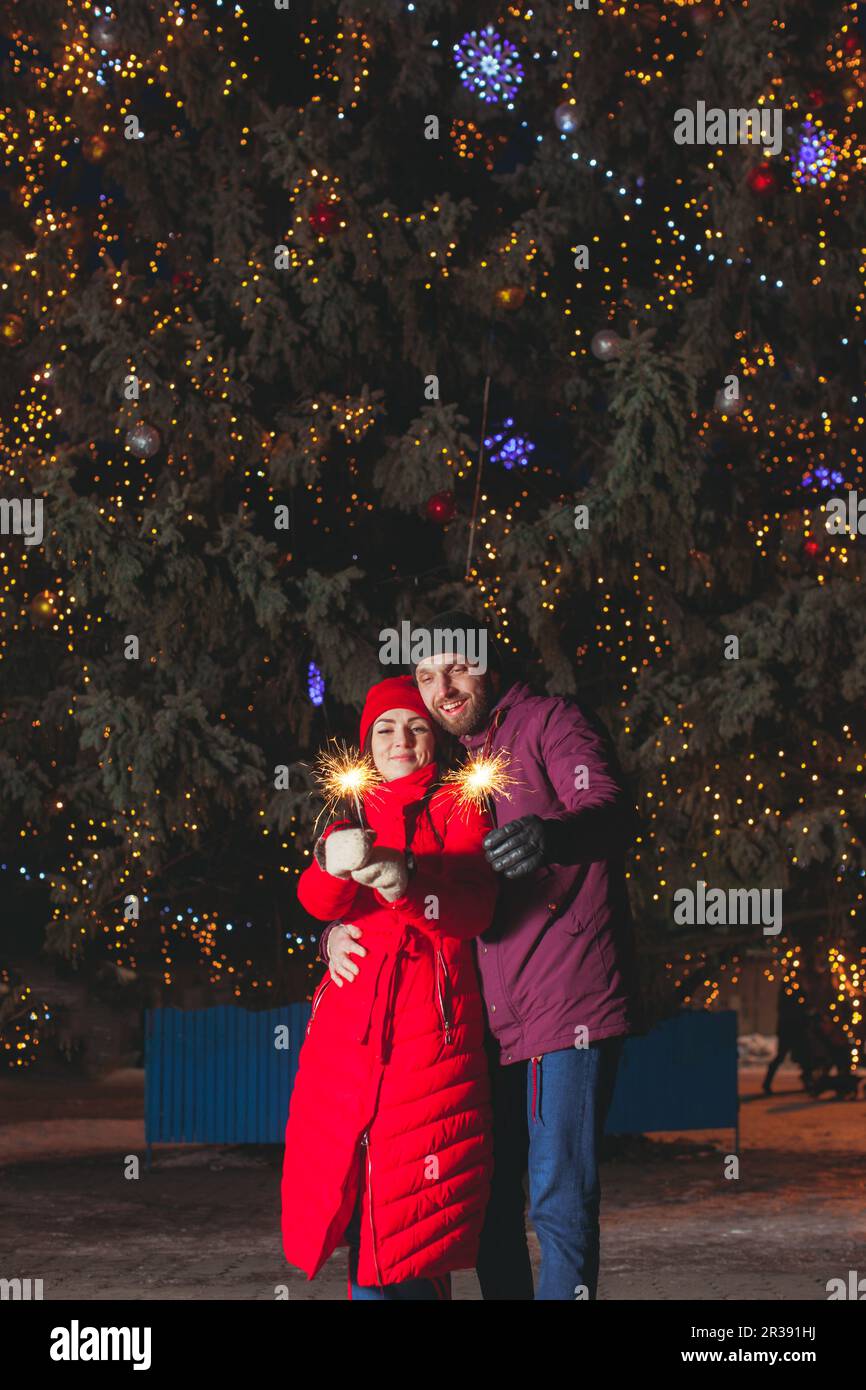 Man woman sparkling lights hi-res stock photography and images - Alamy