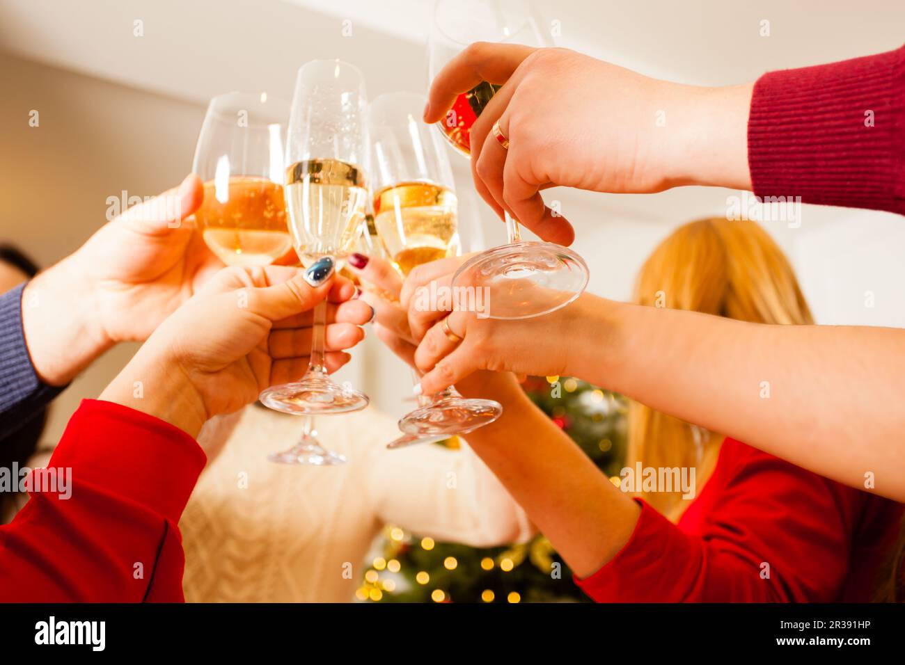 Woman hands toasting celebrate hi-res stock photography and images - Alamy