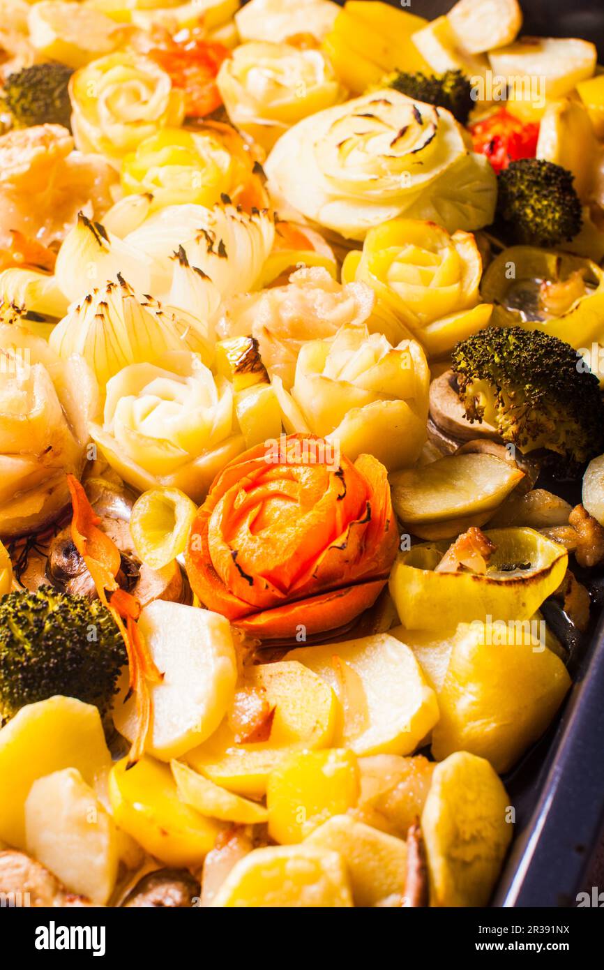Carved vegetables and fat after baking, close up Stock Photo - Alamy