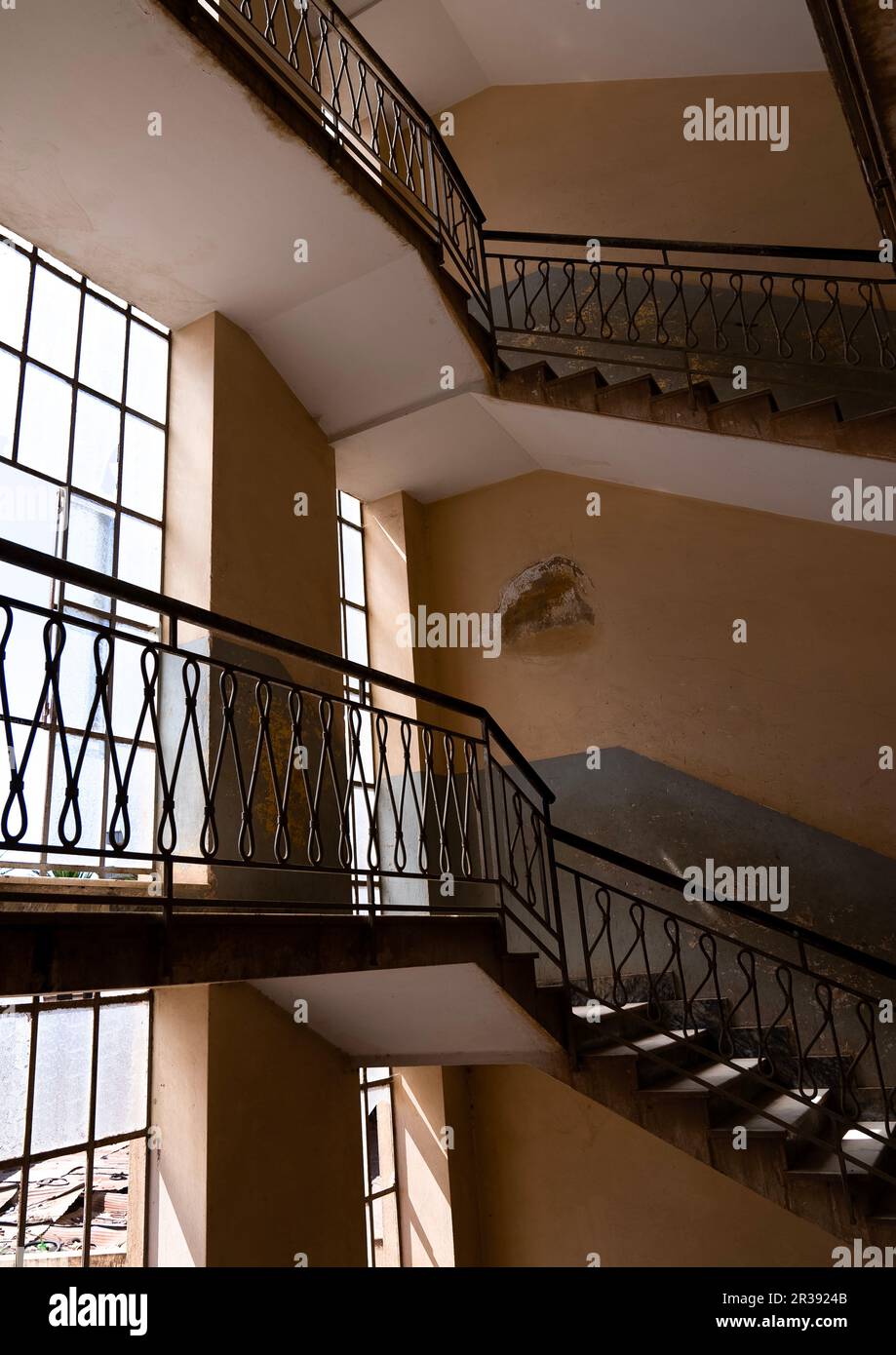 Stairs in an old italian colonial building, Central Region, Asmara ...