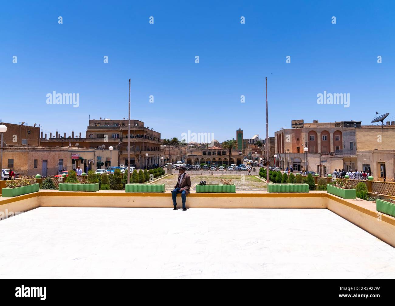 Eritrean man sit on the Grand mosque kulafa al rashidin esplanade ...