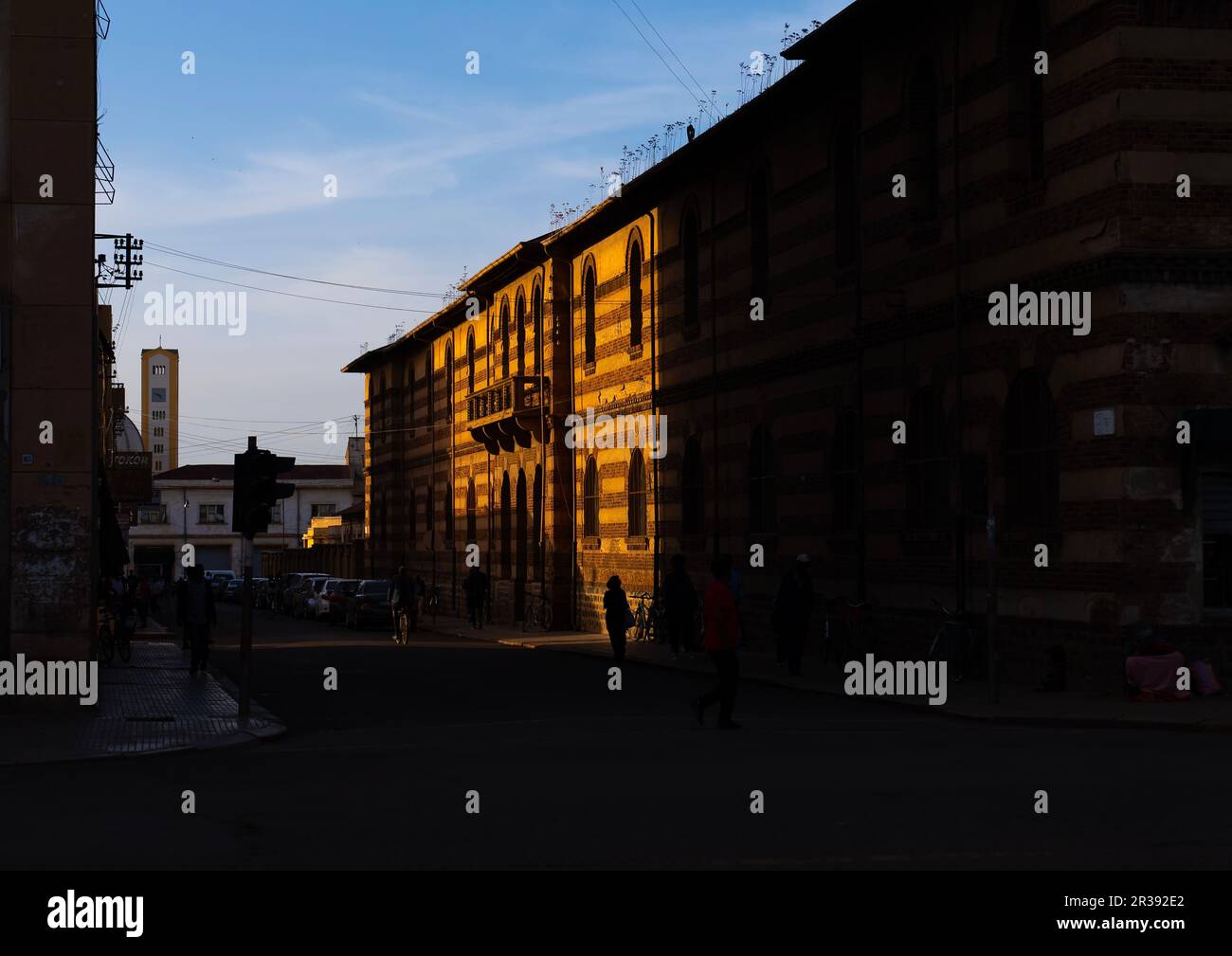 Old colonial italian buildings in the sunset, Central Region, Asmara ...