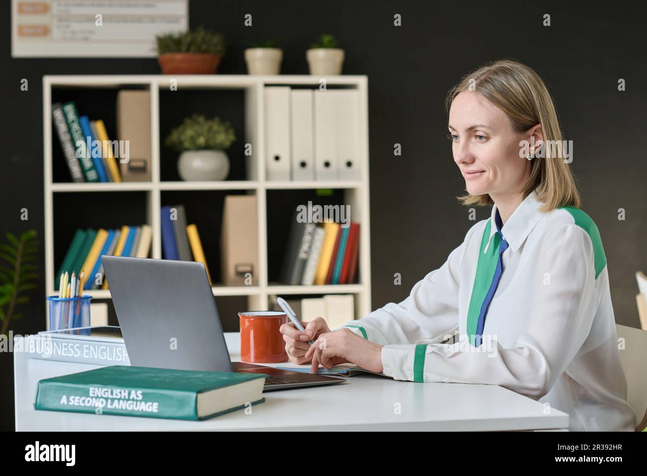 English teacher preparing lesson hi-res stock photography and images ...
