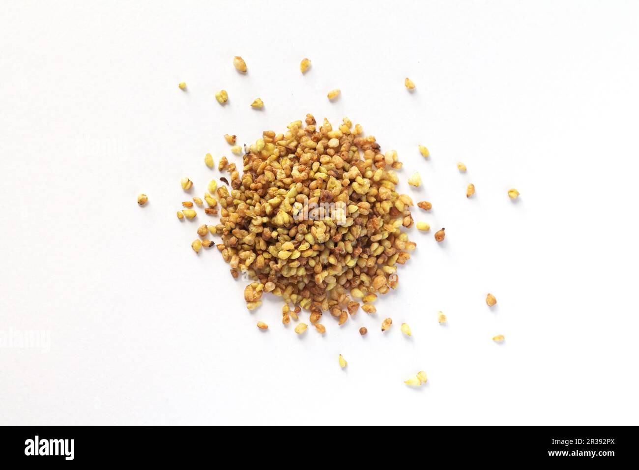Heap of buckwheat tea isolated on white background. Whole roasted ...