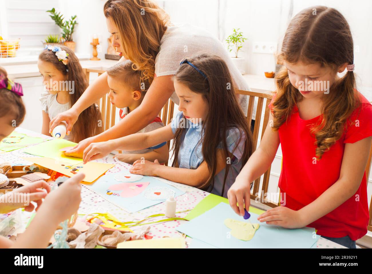 Children attend class on how to make postcards Stock Photo - Alamy