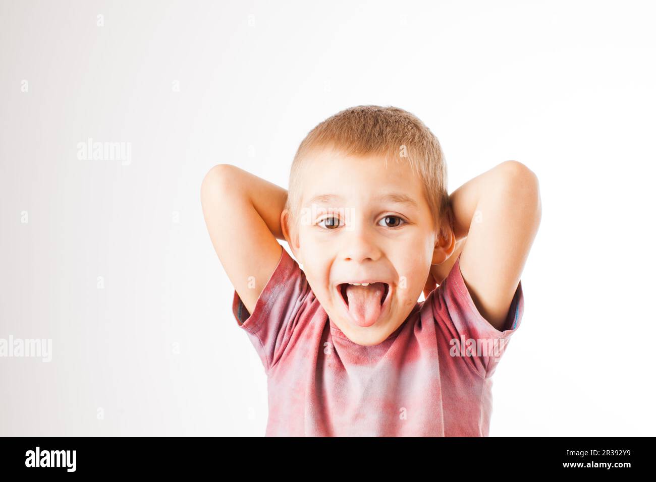 Young messy boy with chocolate on his face Stock Photo - Alamy