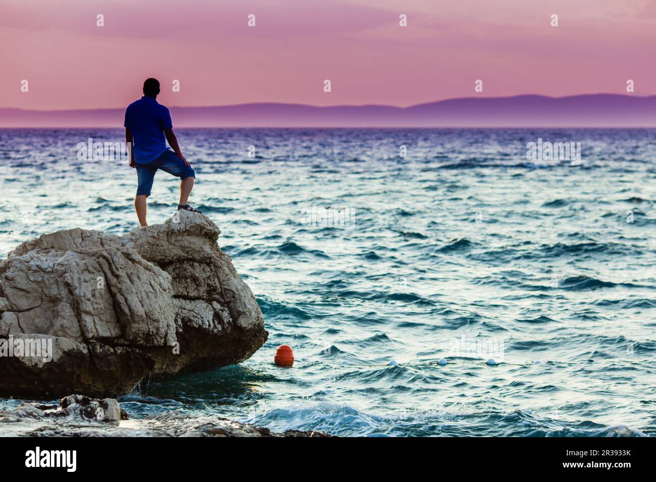 Rock man standing hi-res stock photography and images - Alamy