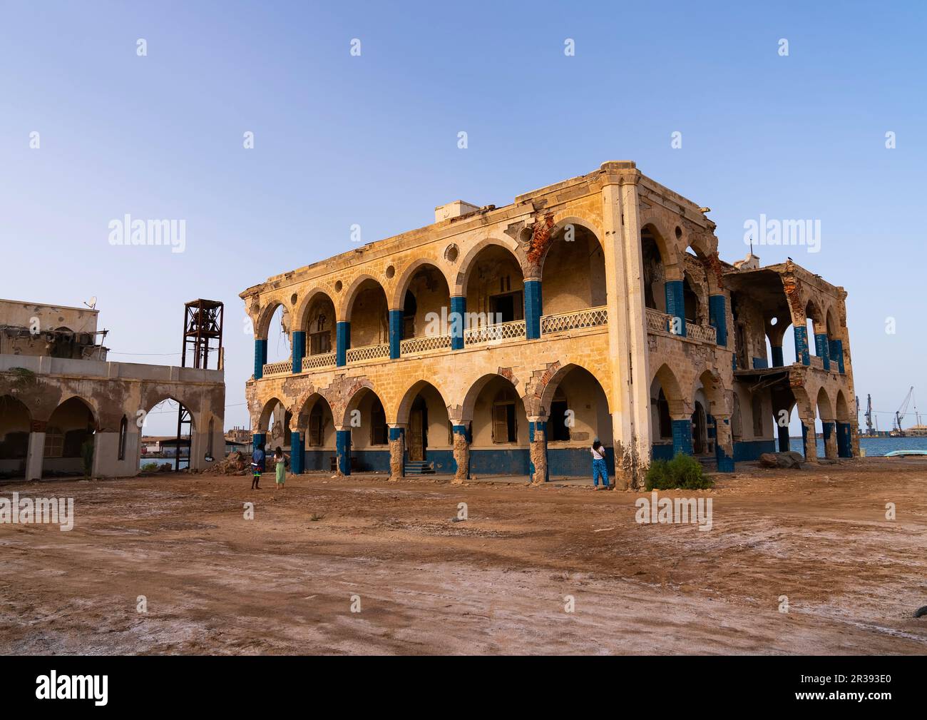 Tourists visiting the ruins of the old palace of Haile Selassie ...