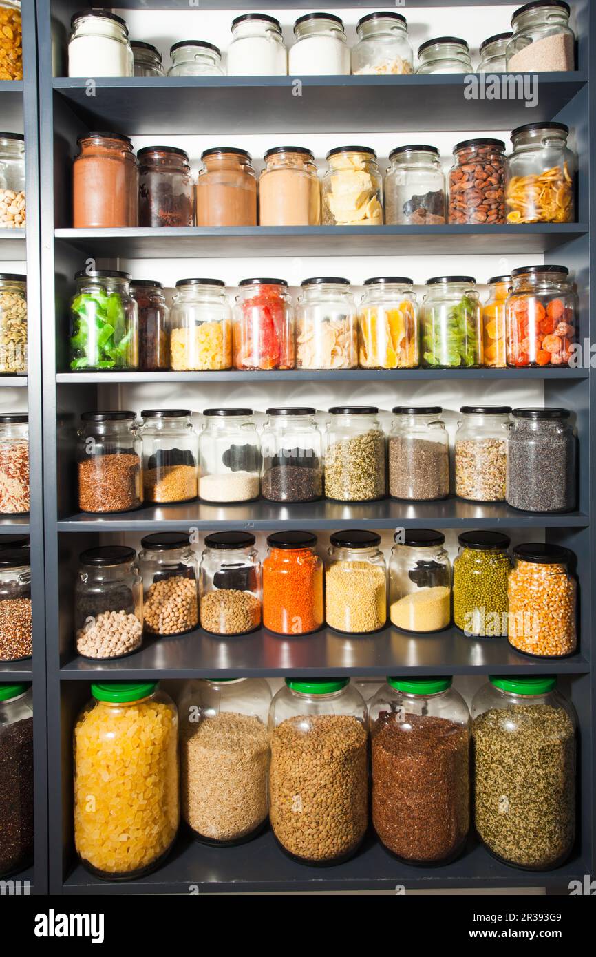 Shelf in a shop with colorful natural herbs and spices Stock Photo - Alamy