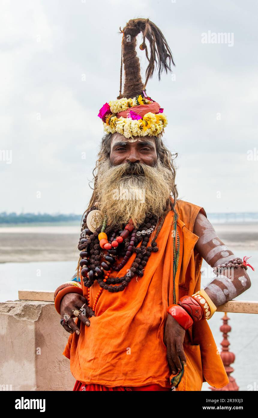 Portrait of a Sadhu in traditional dress against the background of the ...