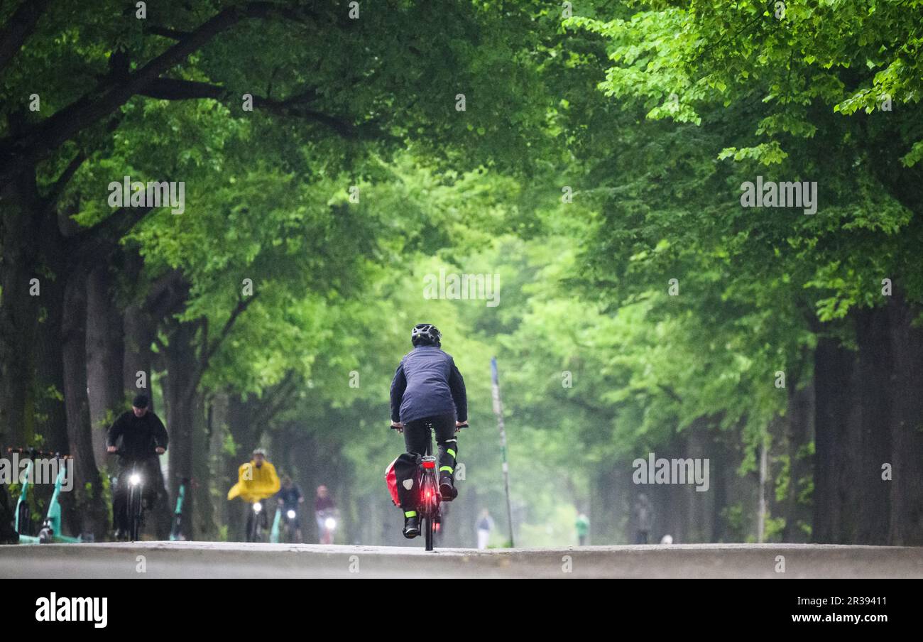 Hanover, Germany. 23rd May, 2023. Cyclists are riding in the rain on an ...