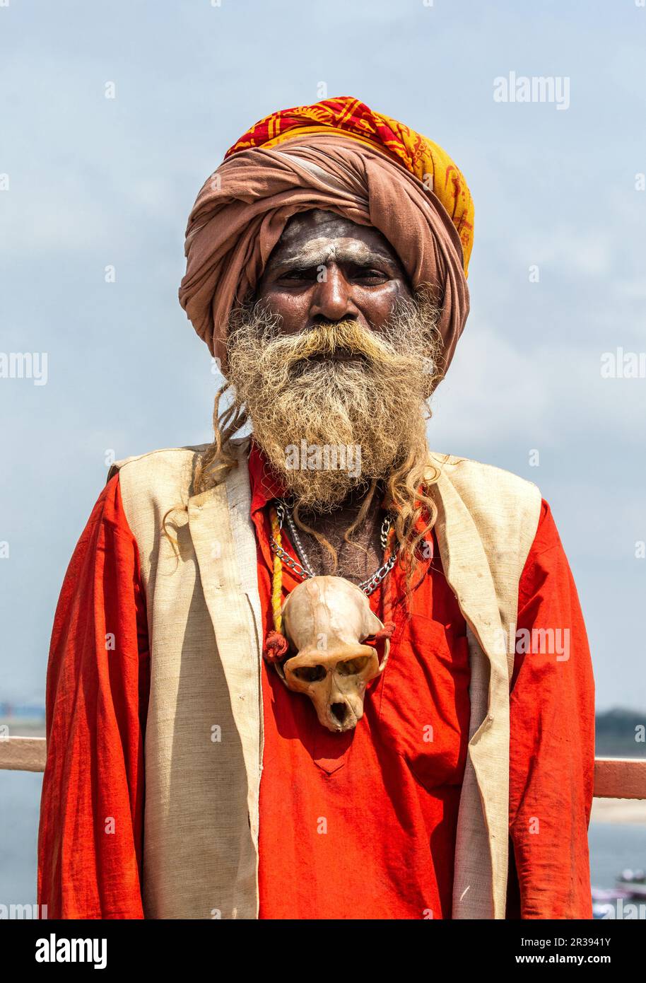 Portrait of a Sadhu in traditional dress against the background of the ...