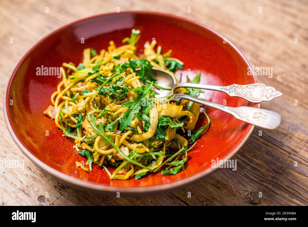 Noodles with white cabbage and rocket Stock Photo - Alamy