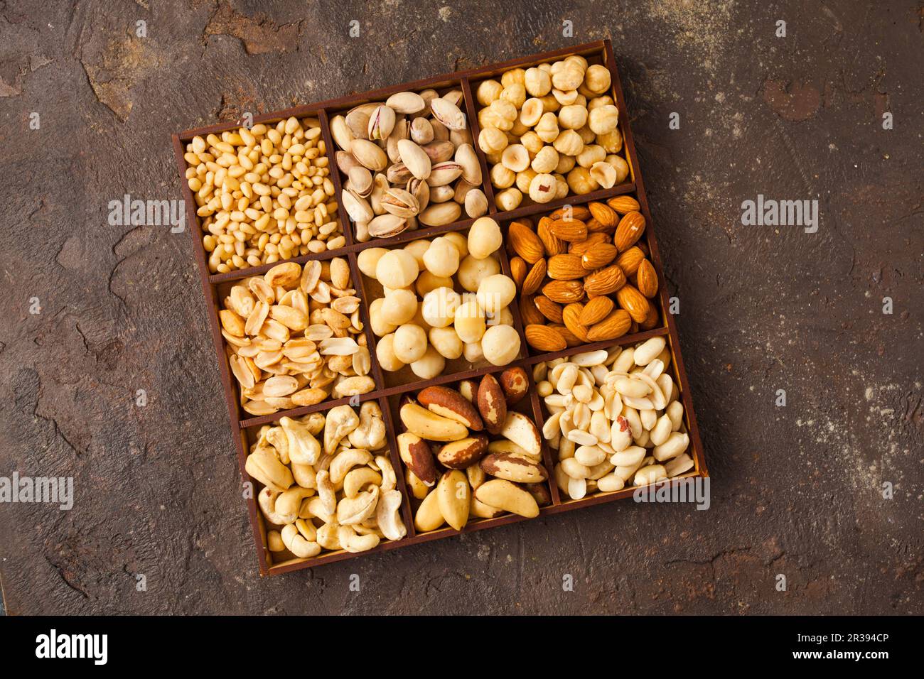 Variety of nuts in wooden box from top view Stock Photo - Alamy