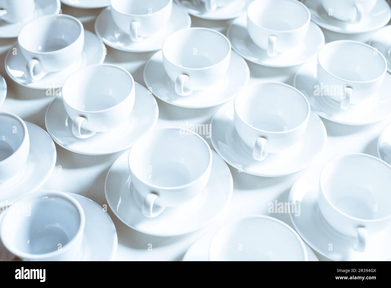 Simple pattern made of empty cups of coffee Stock Photo - Alamy