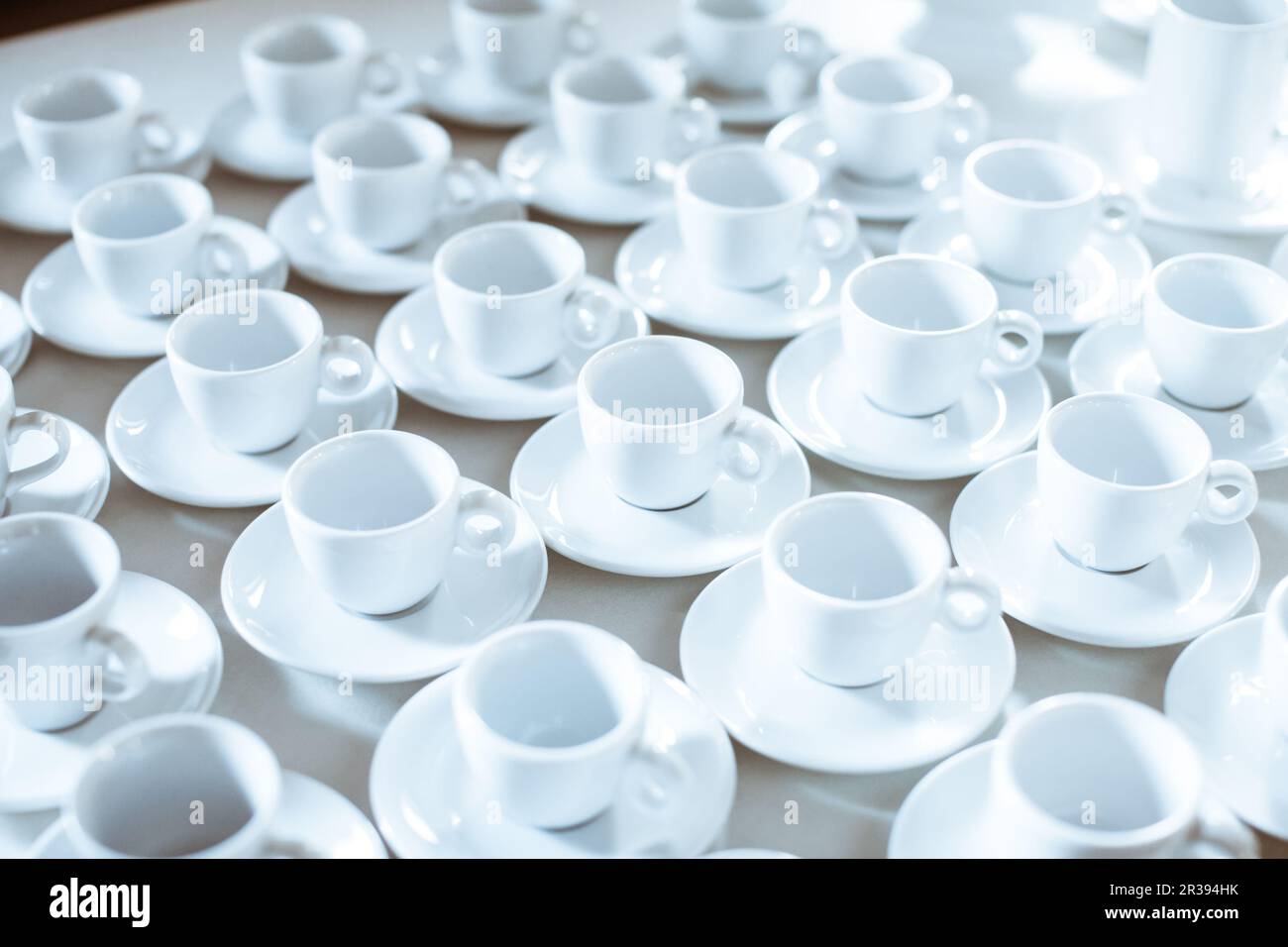 Simple pattern made of empty cups of coffee Stock Photo - Alamy