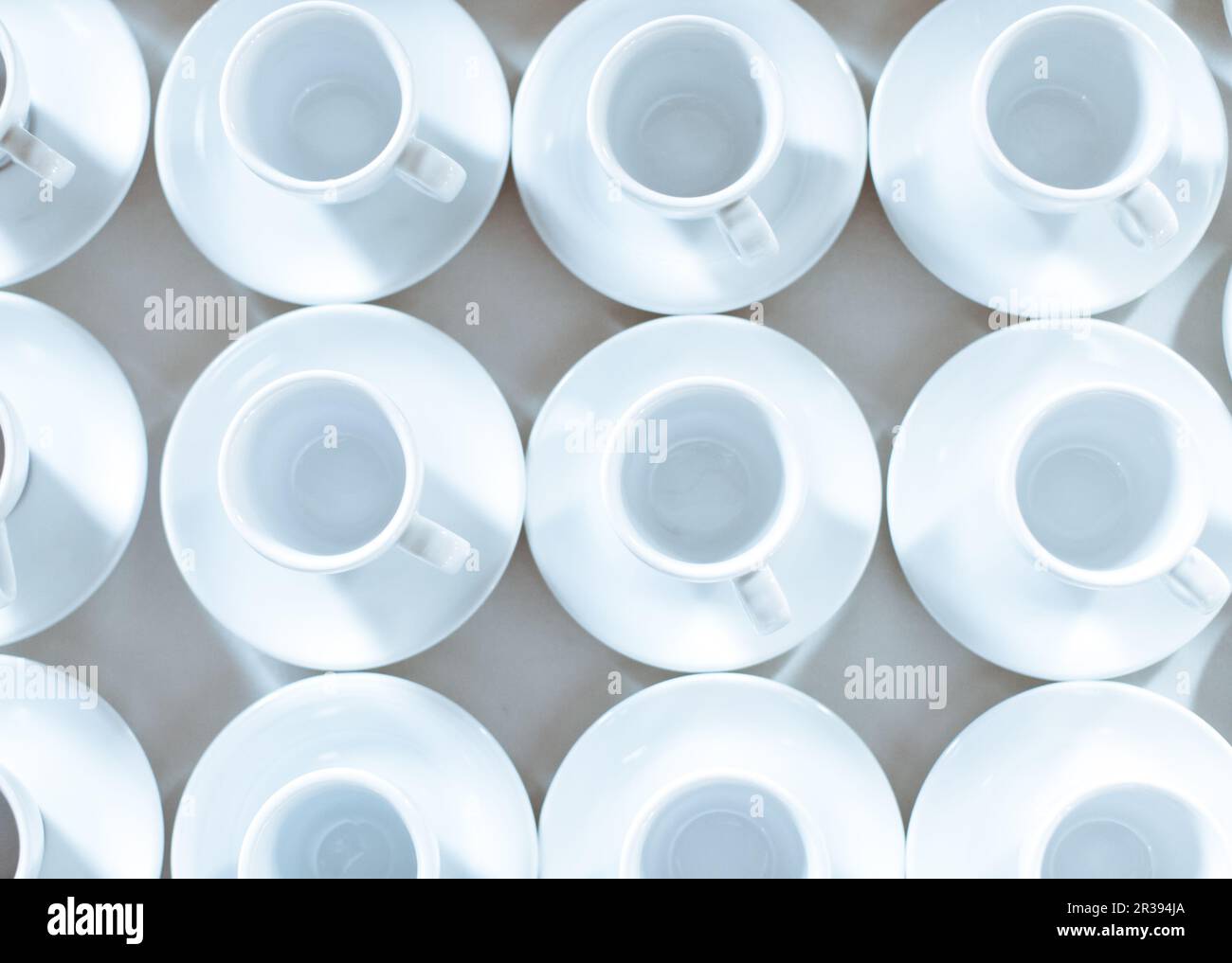 Simple pattern made of empty cups of coffee Stock Photo - Alamy