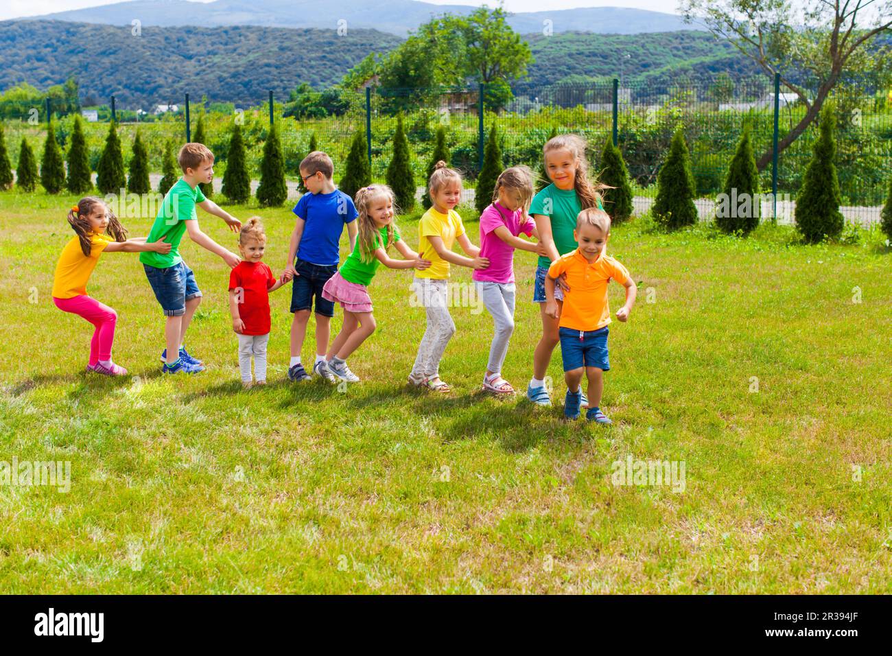 Kids have fun outdoors, friendship and teamwork concept Stock Photo - Alamy