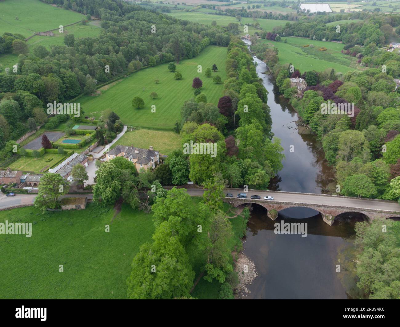 Armathwaite village in cumbria and bridge over the river eden Stock ...