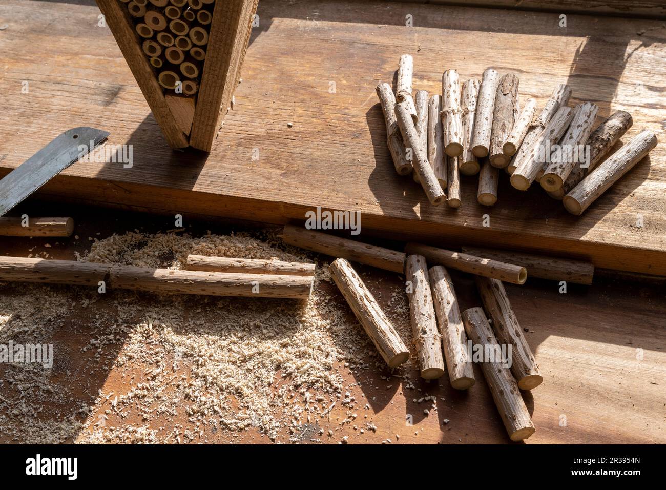 Making wooden insect house decorative bug hotel Stock Photo - Alamy