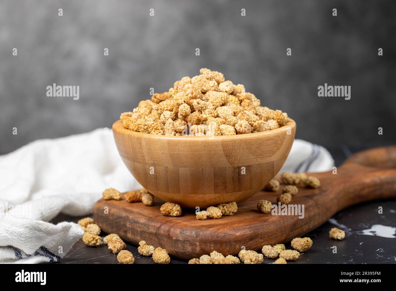 Dried mulberry. Sun-dried dried mulberry in wooden bowl. superfood ...