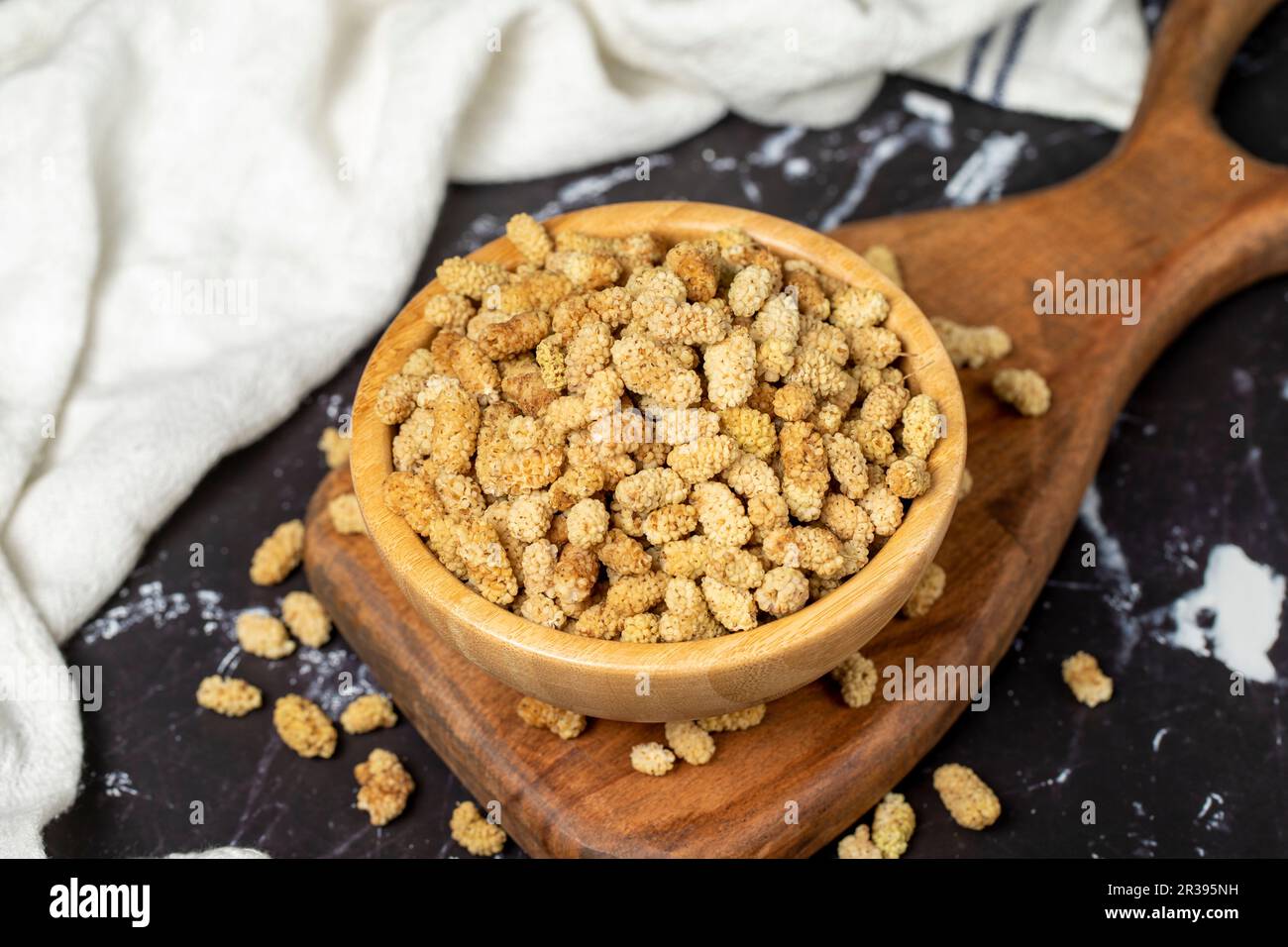 Dried mulberry. Sun-dried dried mulberry in wooden bowl. superfood ...