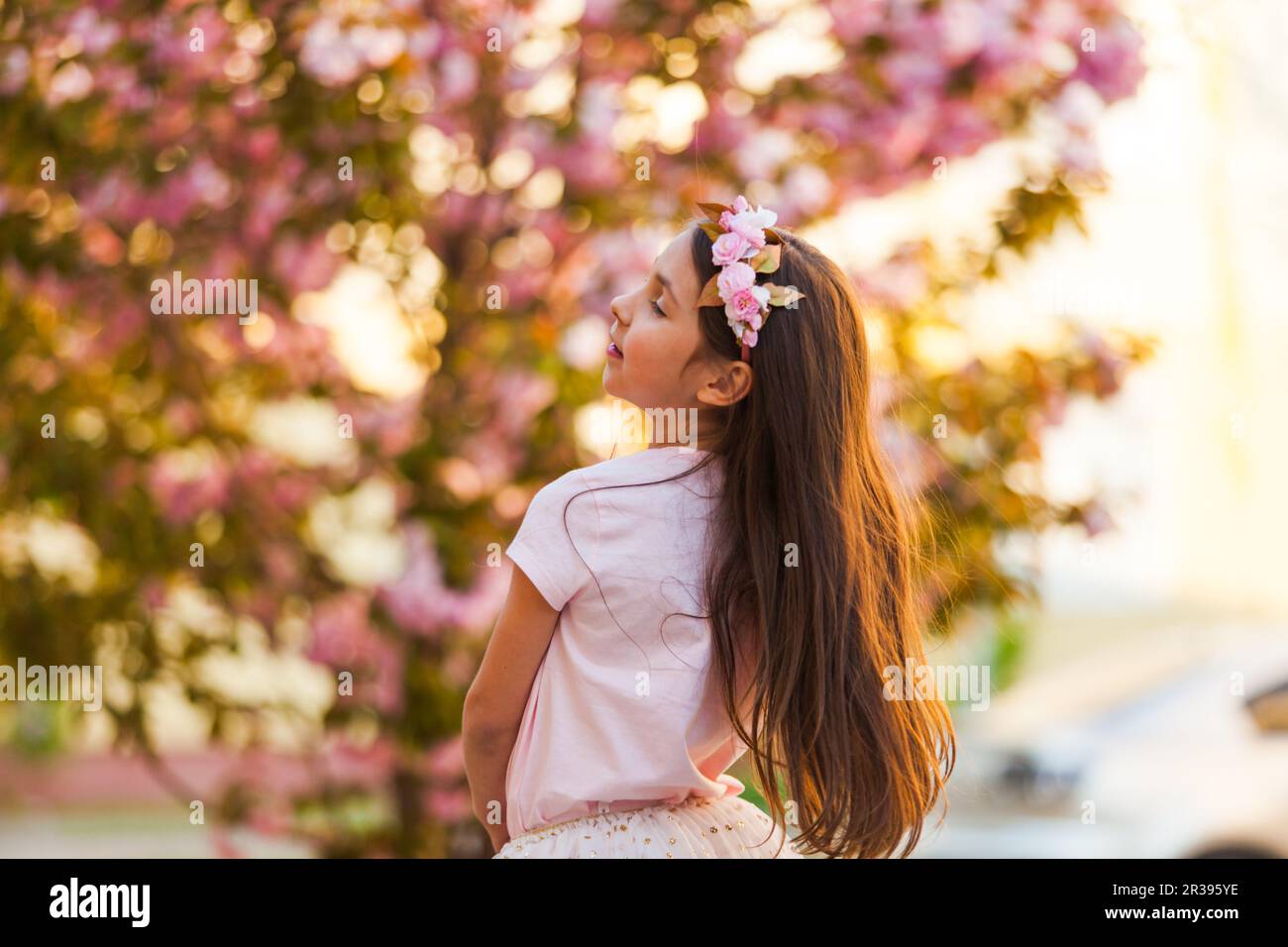 Spring portrait, adorable little girl dance near sakura tree Stock ...