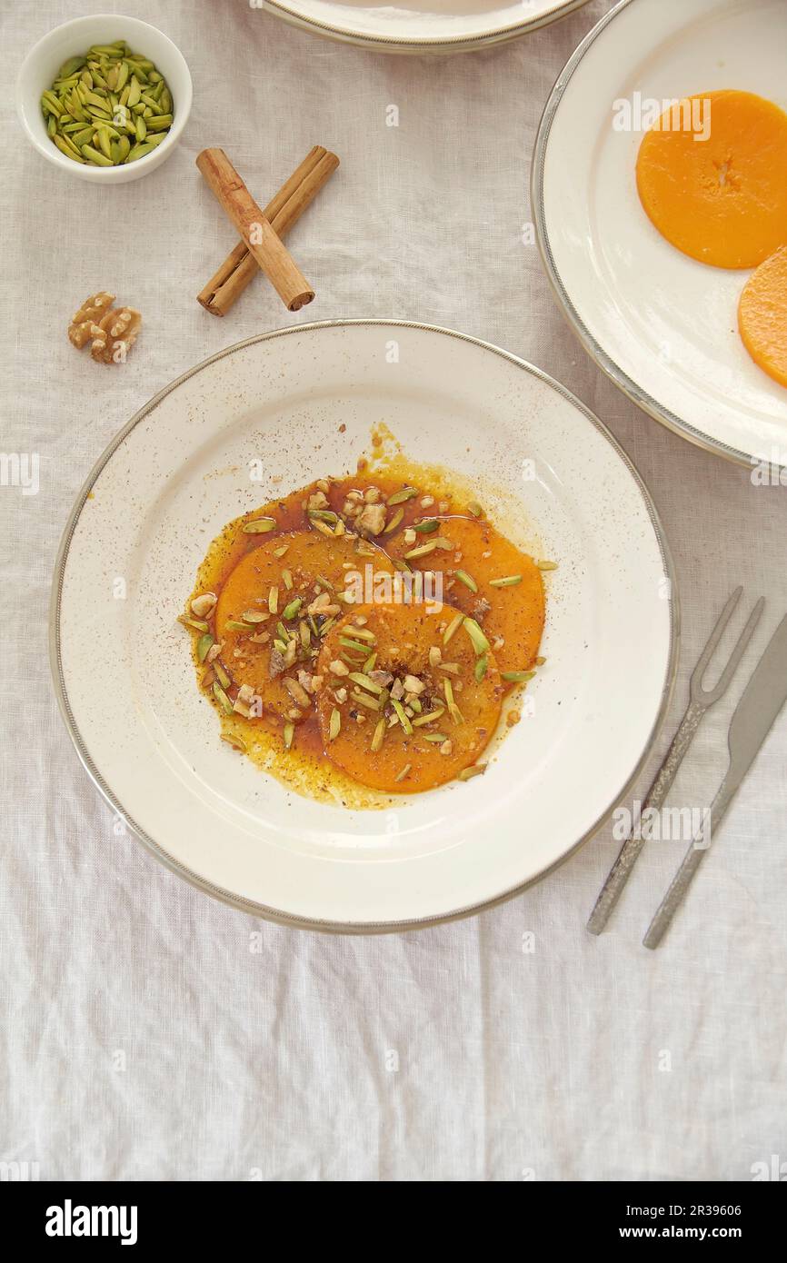 Butternut squash in saffron and cinnamon syrup (Persian dessert Stock ...