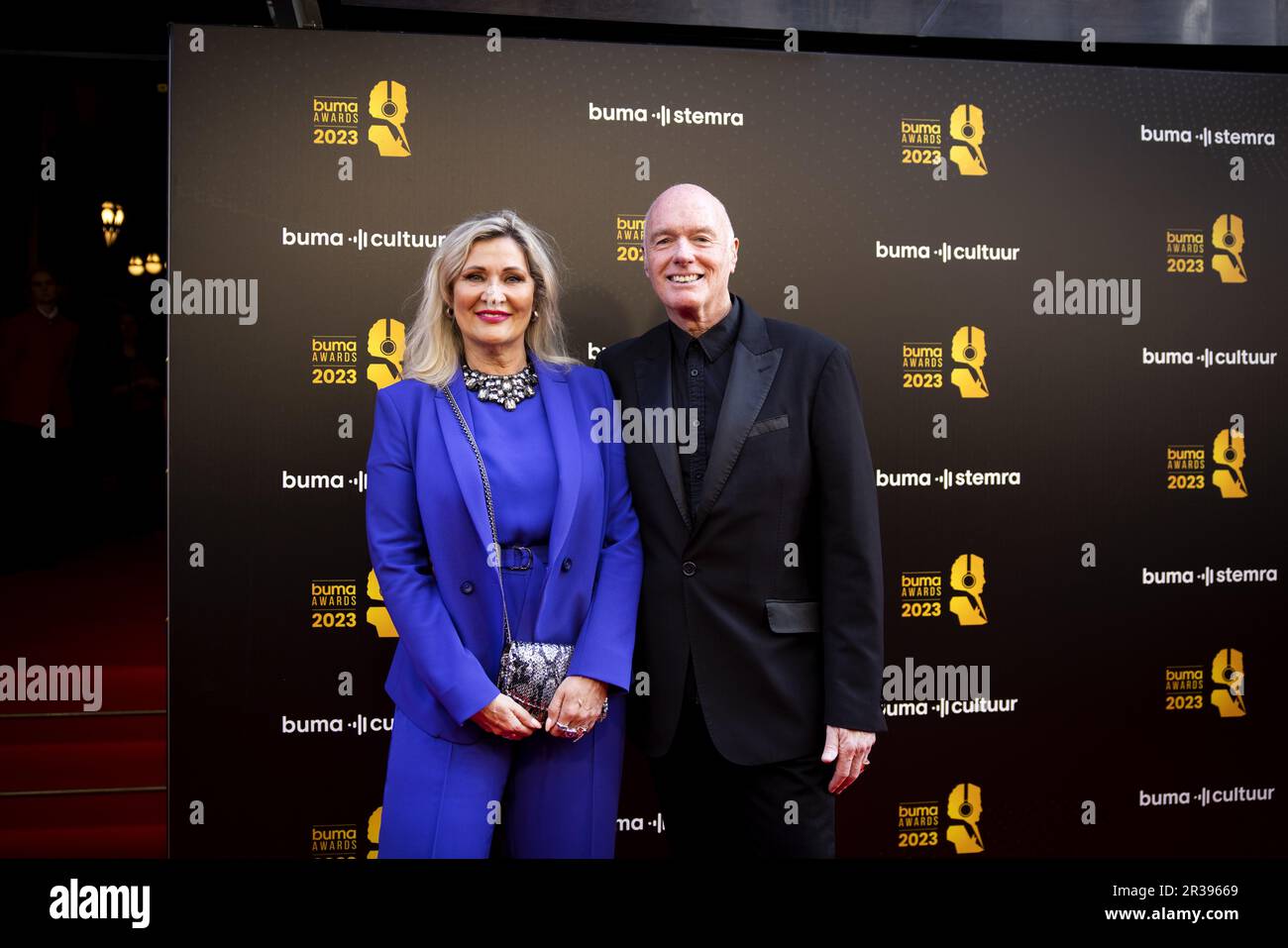 AMSTERDAM - Ferdi Bolland with his wife on the red carpet, prior to the ...