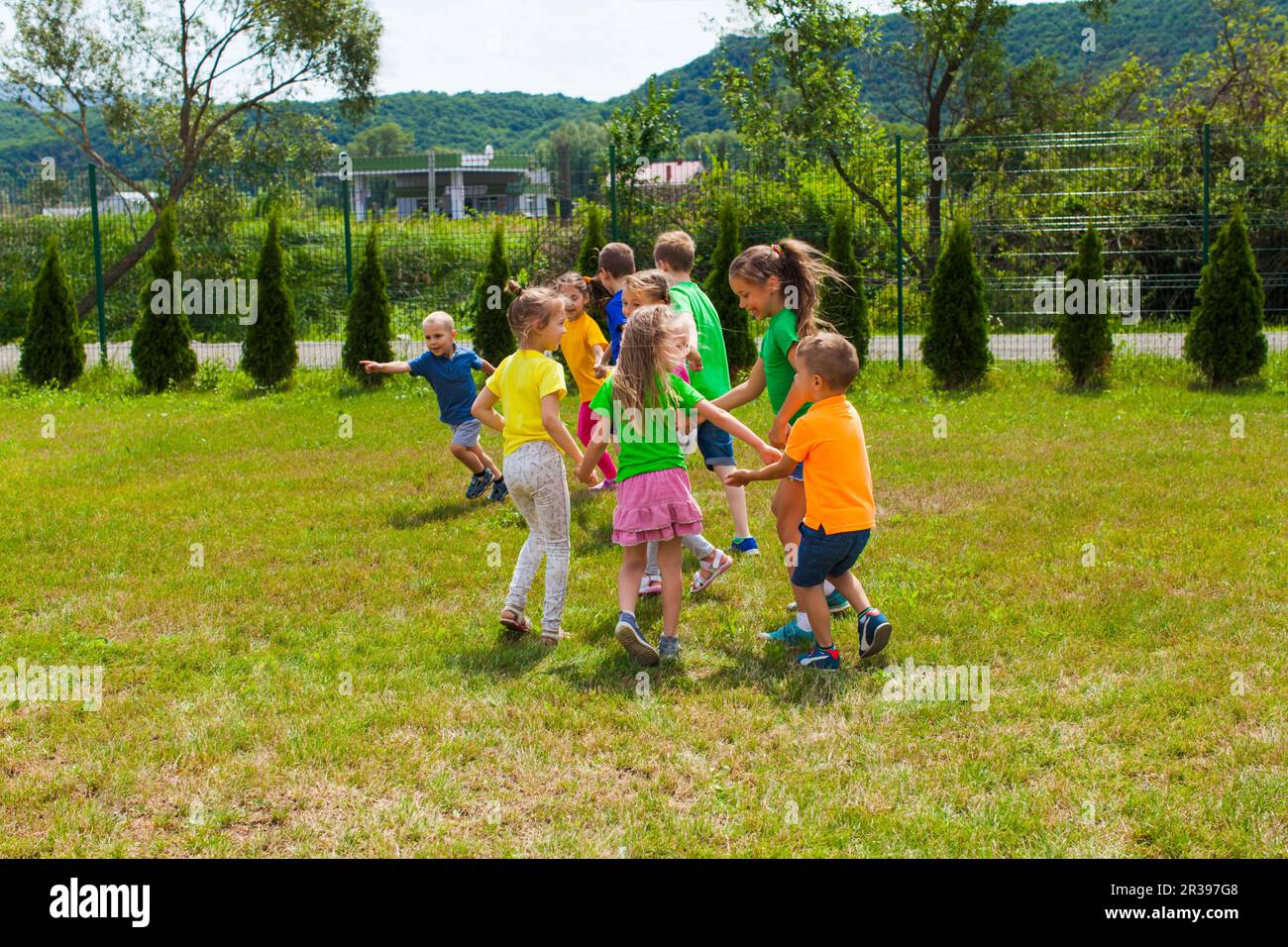 Children are preparing to dance holding hands in the circle Stock Photo ...