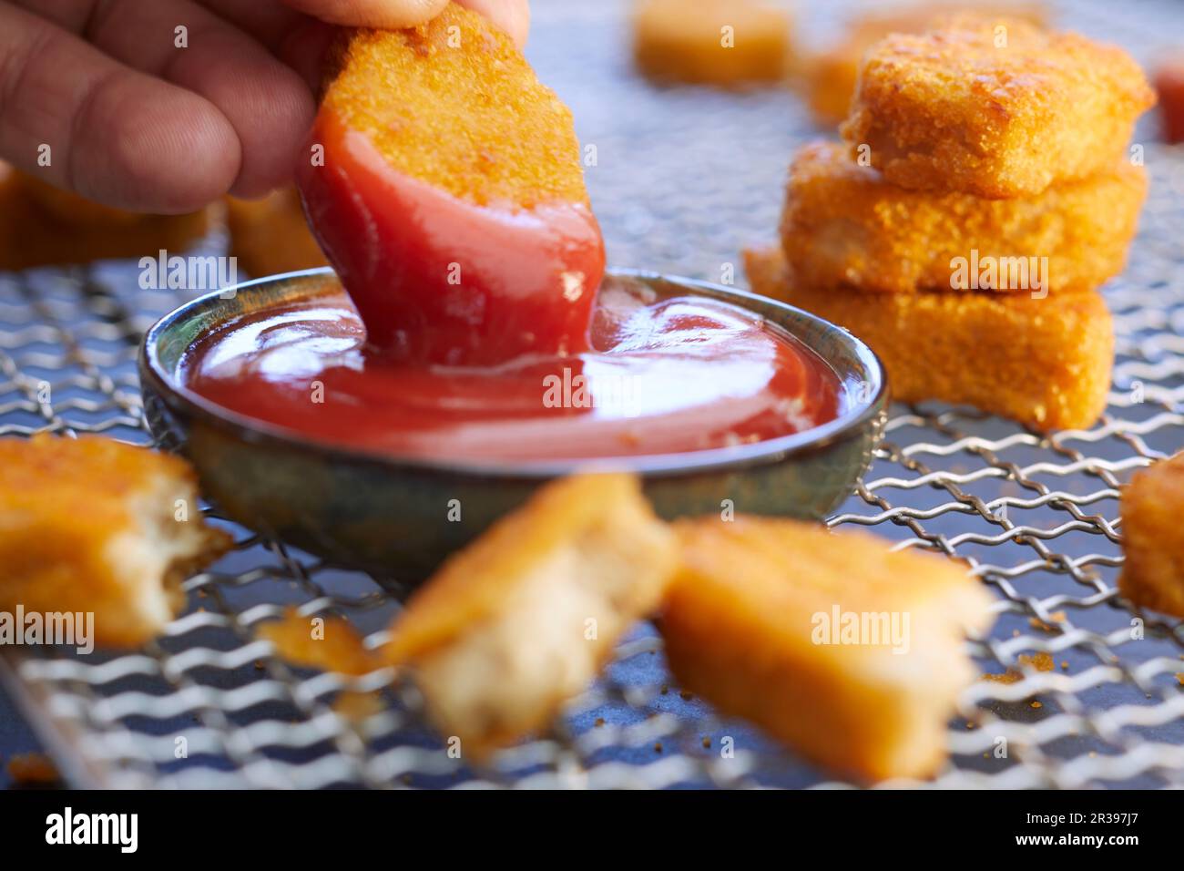Chicken nuggets dunk hi-res stock photography and images - Alamy