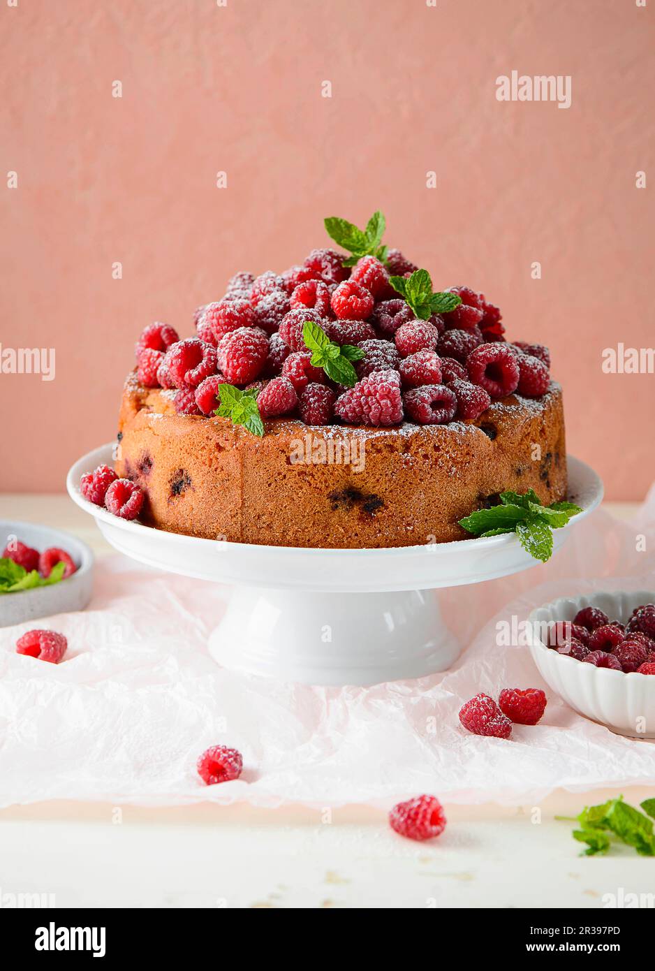 Raspberry yoghurt cake on a cake stand Stock Photo - Alamy