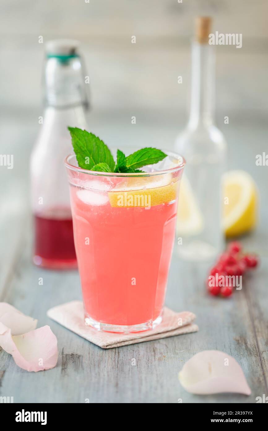 Sharbat (Persian lemonade) with redcurrant syrup, lemon and rose water ...