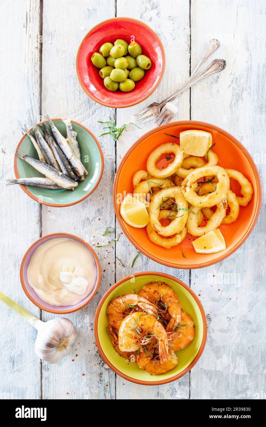 Various tapas with seafood and fish (Spain Stock Photo - Alamy