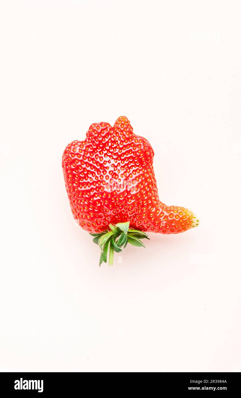 Unusual strawberry in the shape of hand with thumb up similar the like ...