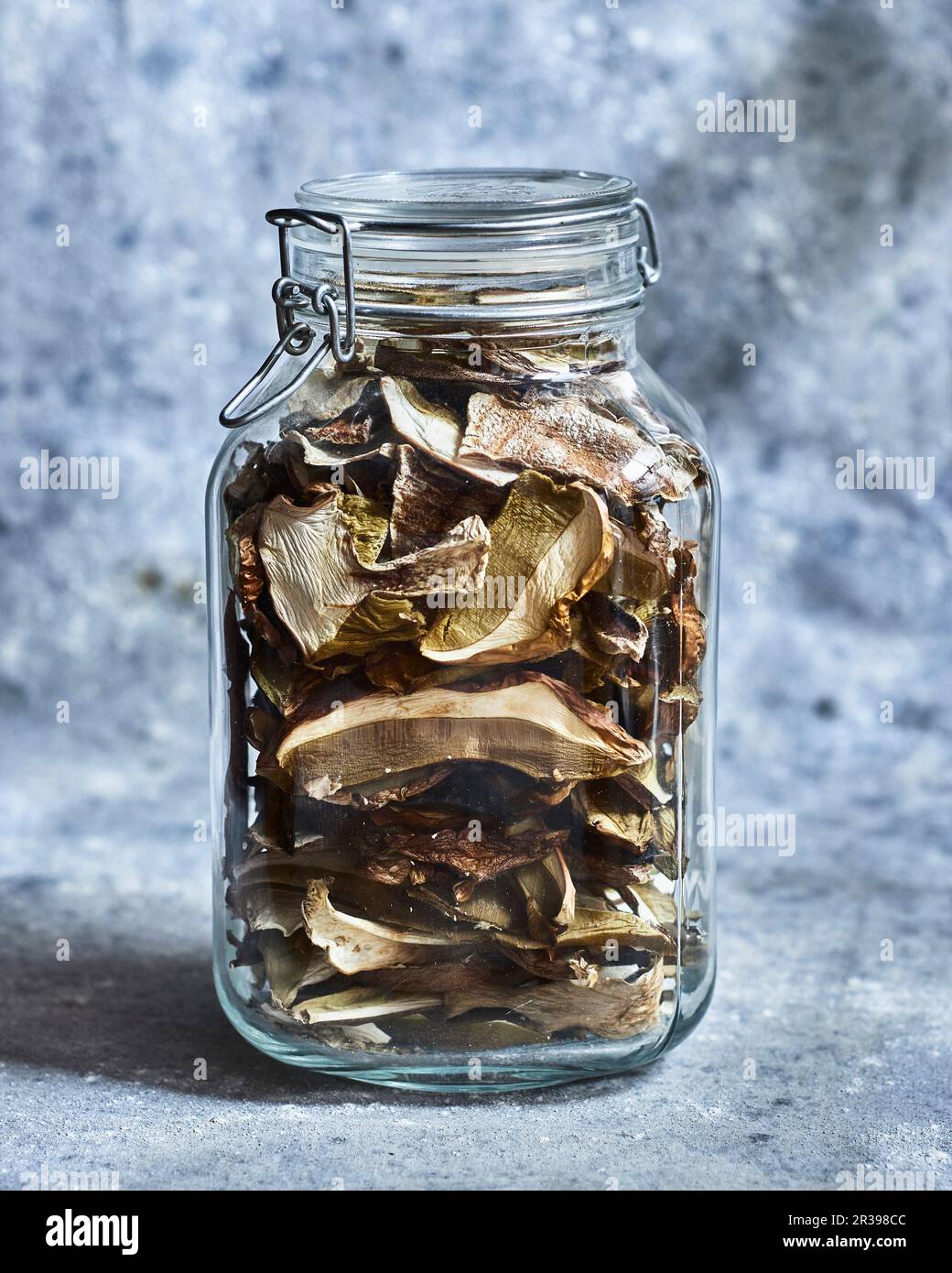 Dried mushrooms in a flip-top jar Stock Photo - Alamy
