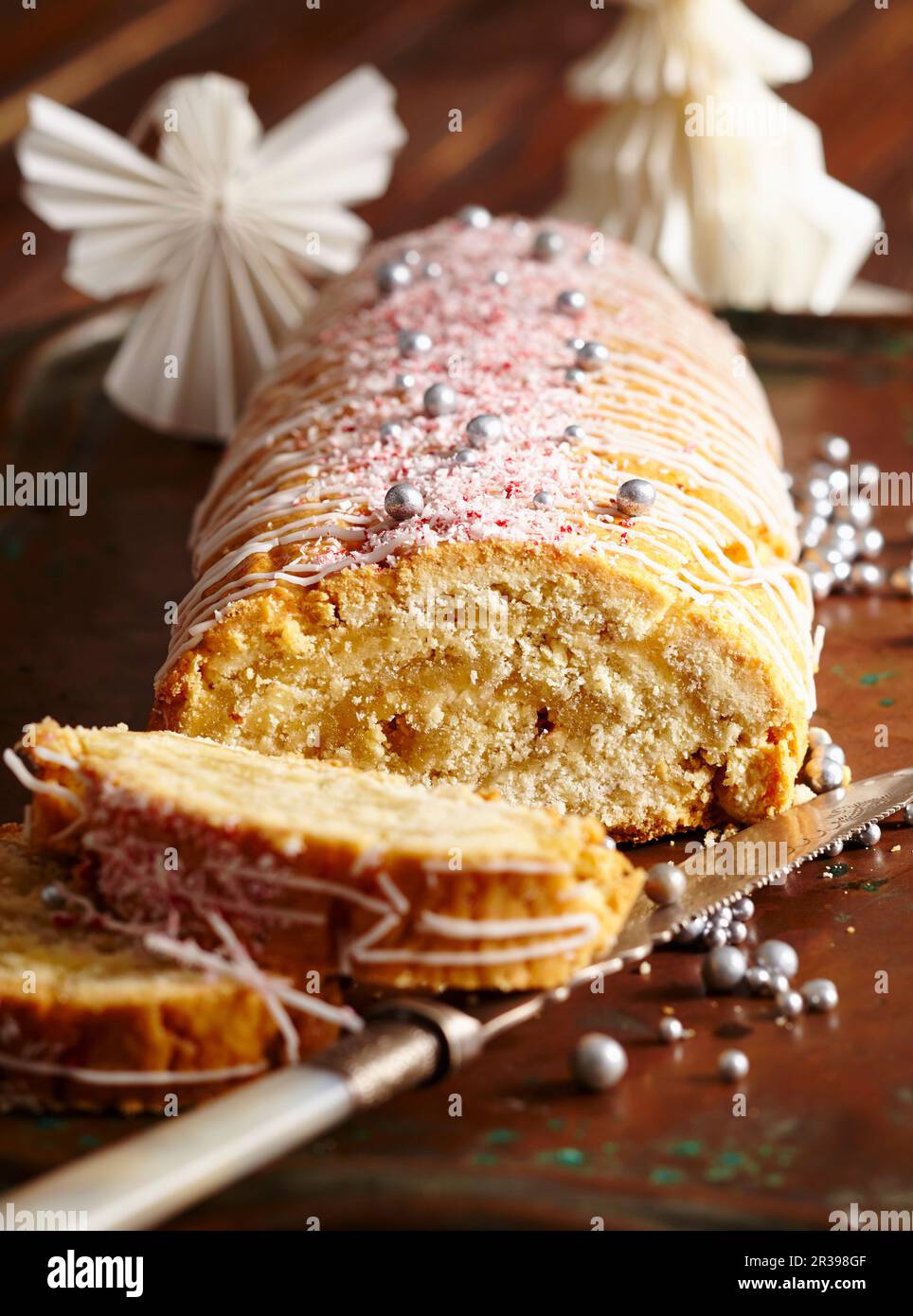 Coconut roulade with a marzipan filling for Christmas Stock Photo - Alamy
