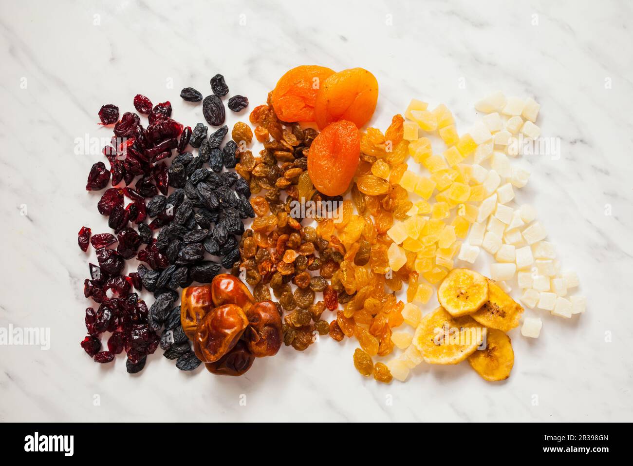 Dried fruits are scattered hi-res stock photography and images - Alamy