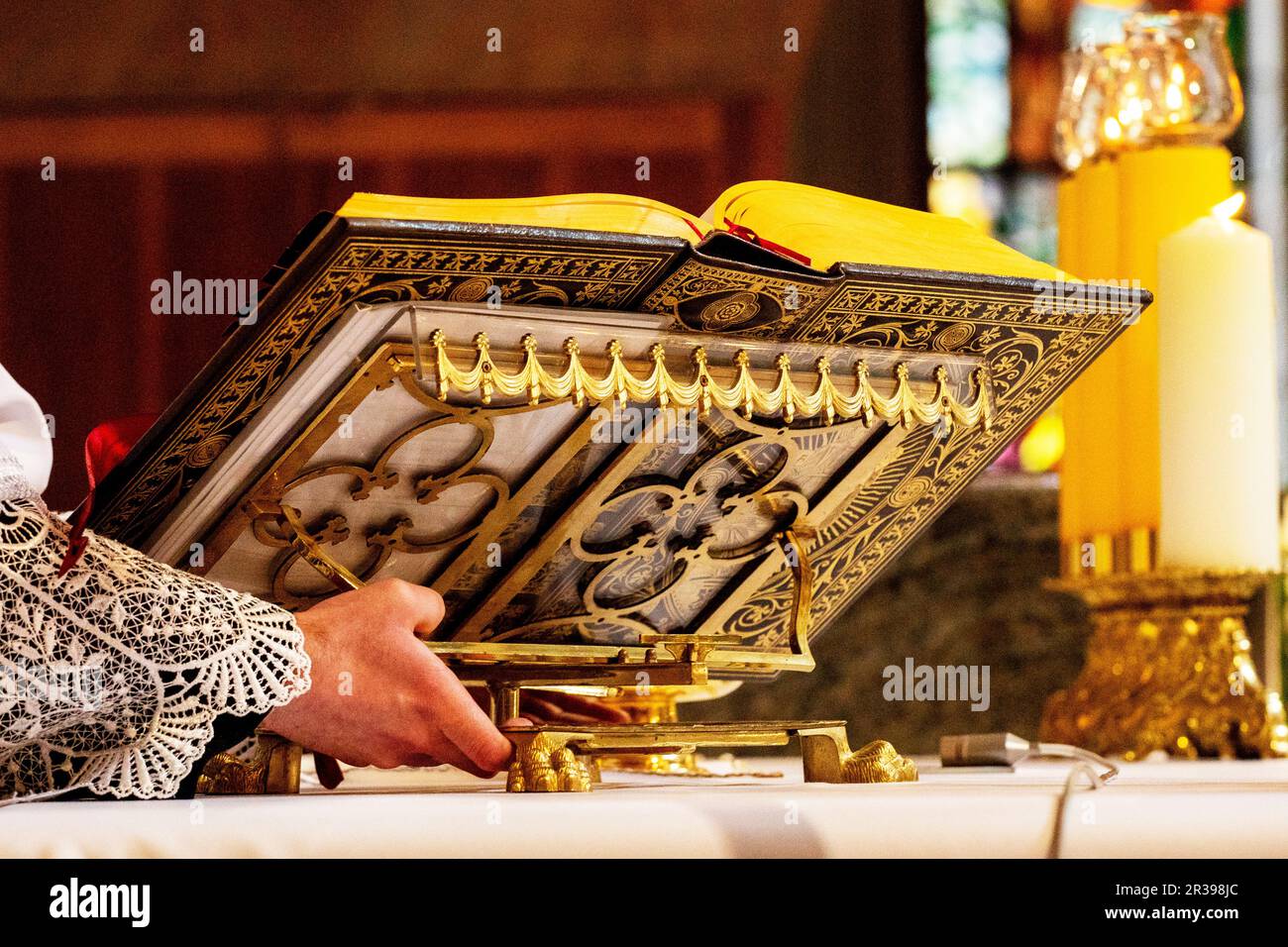 book of the catholic priest on the holy mass near the altar Stock Photo ...