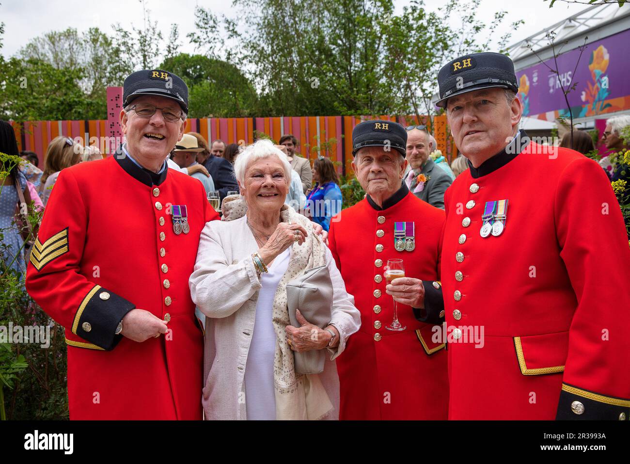 London, UK. 22nd May, 2023. Dame Judi Dench shares a joke with three of ...
