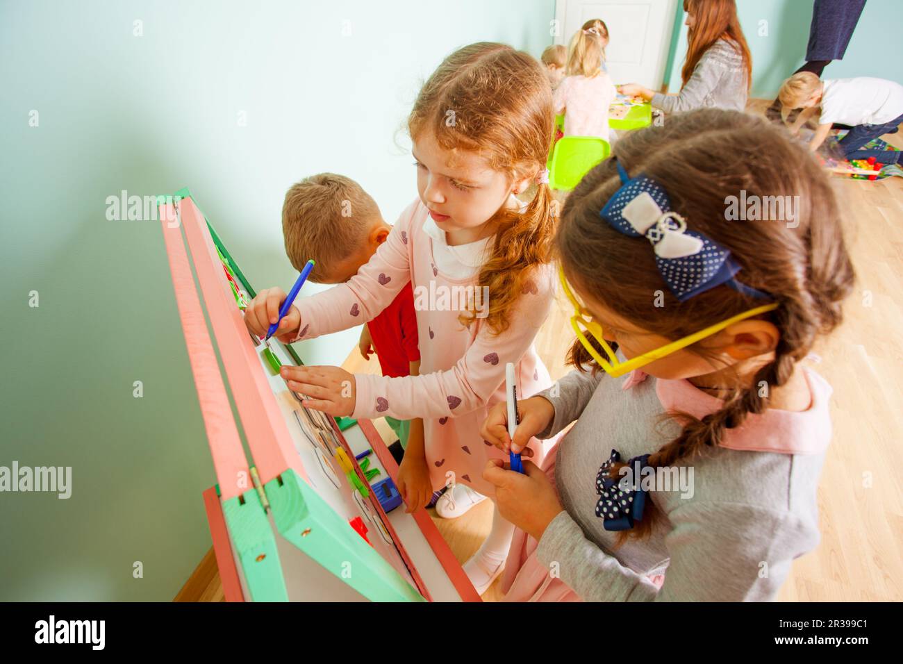 Children of various ages solve the mathematical problems Stock Photo ...