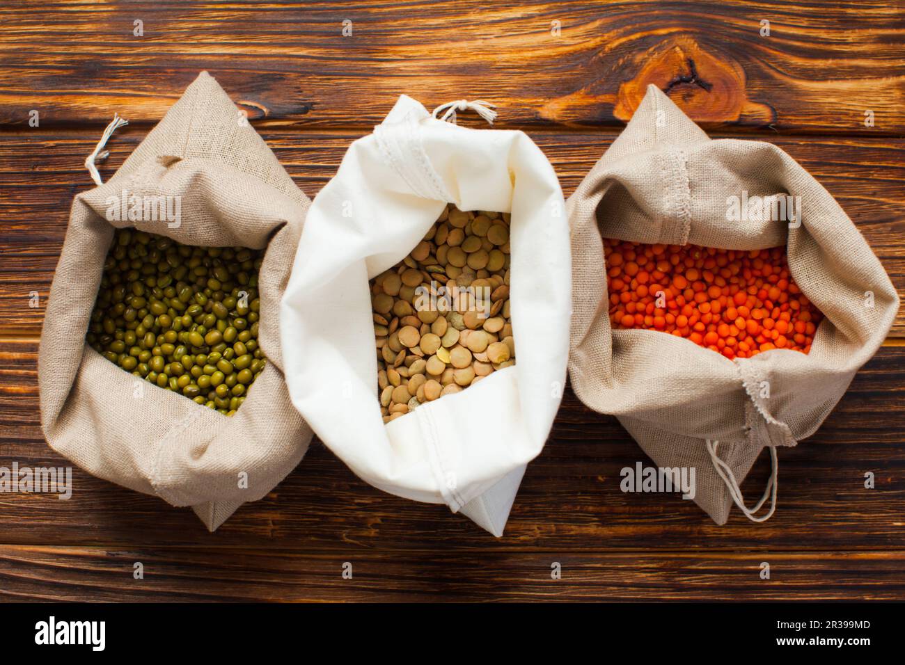 Cotton bags with beans, lentils, mash. Zero waste shopping concept ...